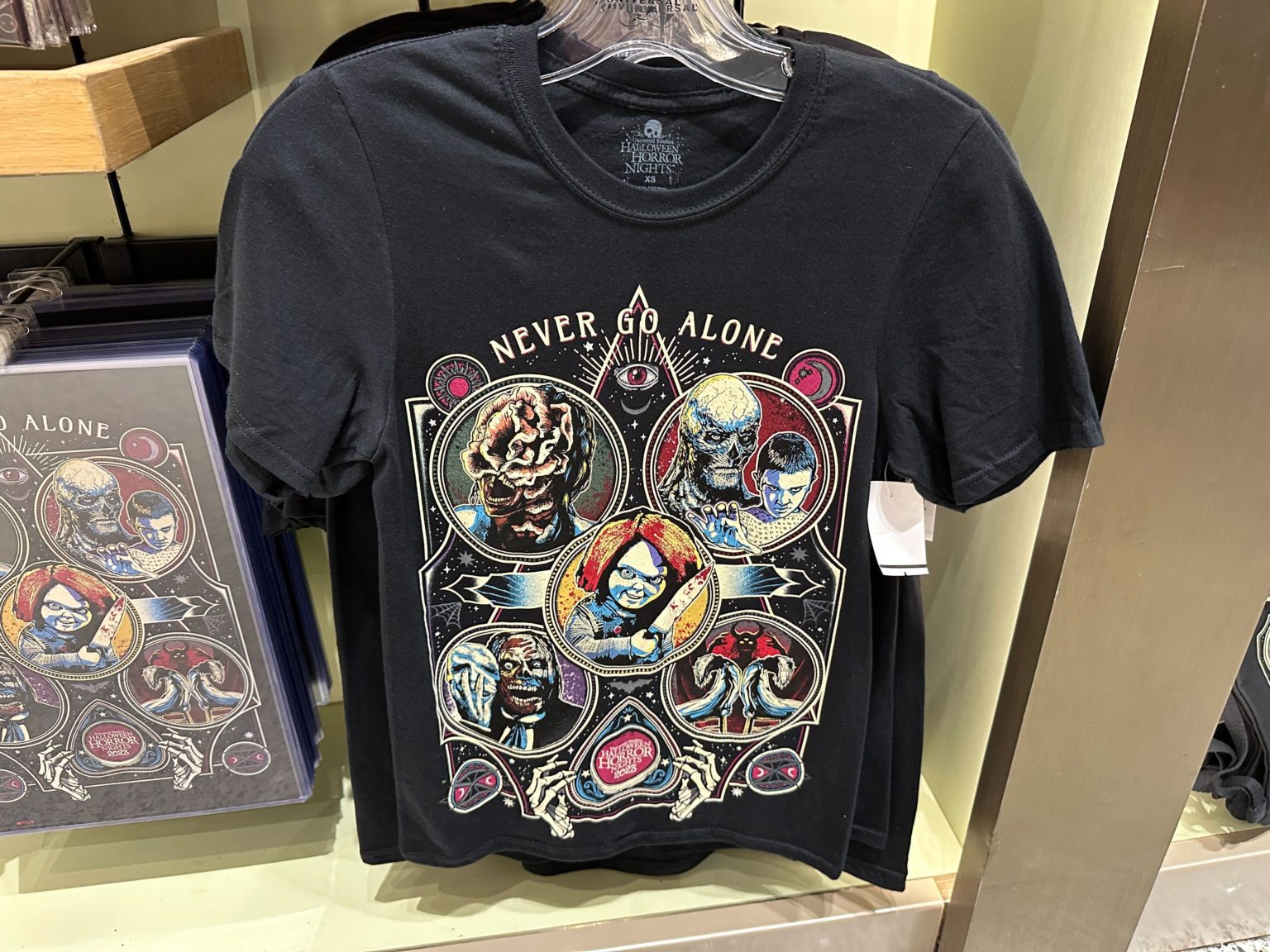 First Look: Halloween Horror Nights Never Go Alone Collection ...